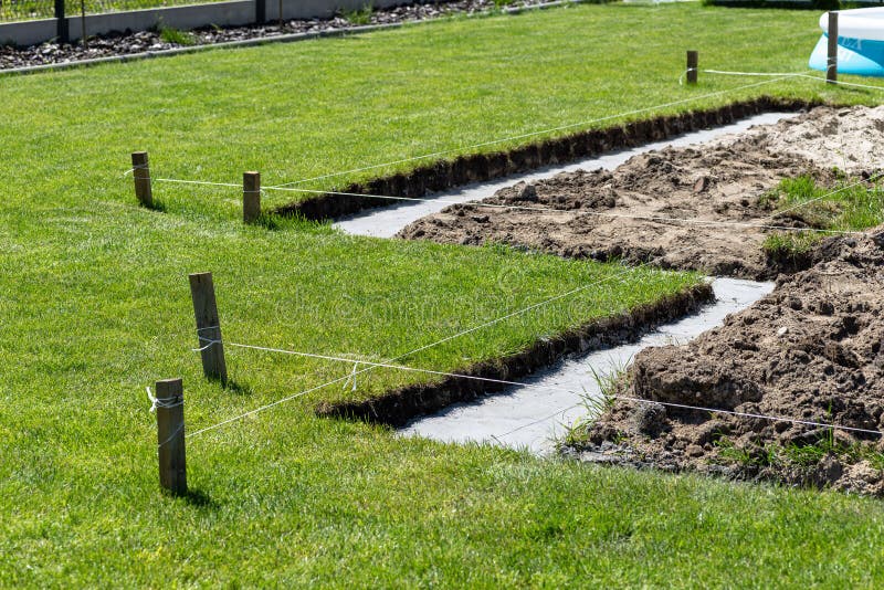 Foundation Footings Poured in a Ditch in the Yard, Building a Terrace ...