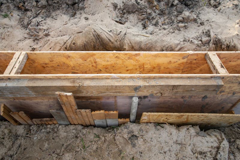 Foundation Formwork Closeup on Construction Site with Sand and Soil ...