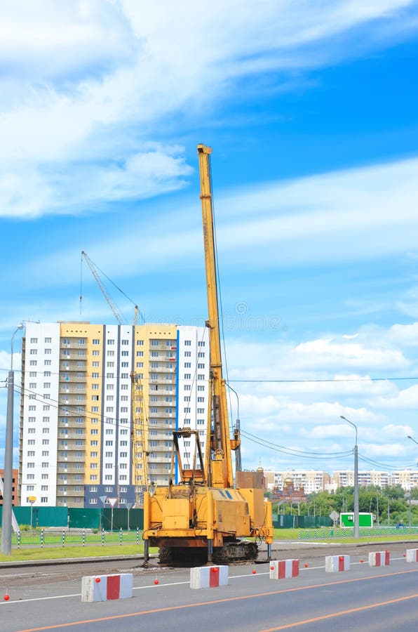 Foundation piles machine stock image. Image of pile, place - 56951091
