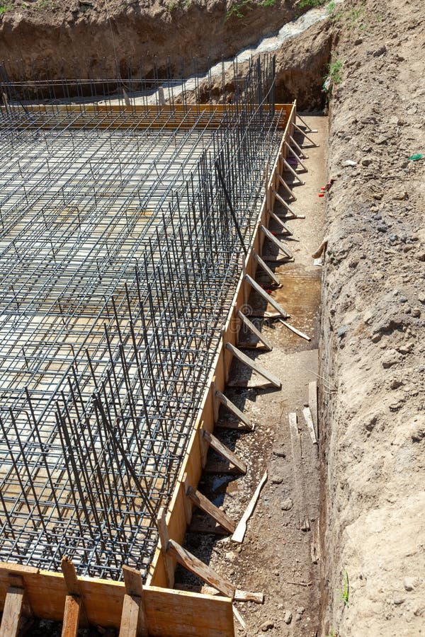 Foundation Reinforcement Steel Bars and Wooden Formwork Preparing for ...