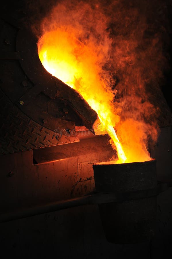 Foundry - Molten Metal Poured from Ladle Stock Photo - Image of filling ...