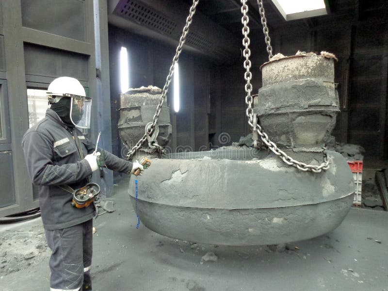 Foundry, Worker operating stock photo. Image of containers - 77704764