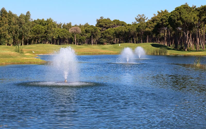 Golf Course Fountain stock image. Image of fountain, sports - 421719