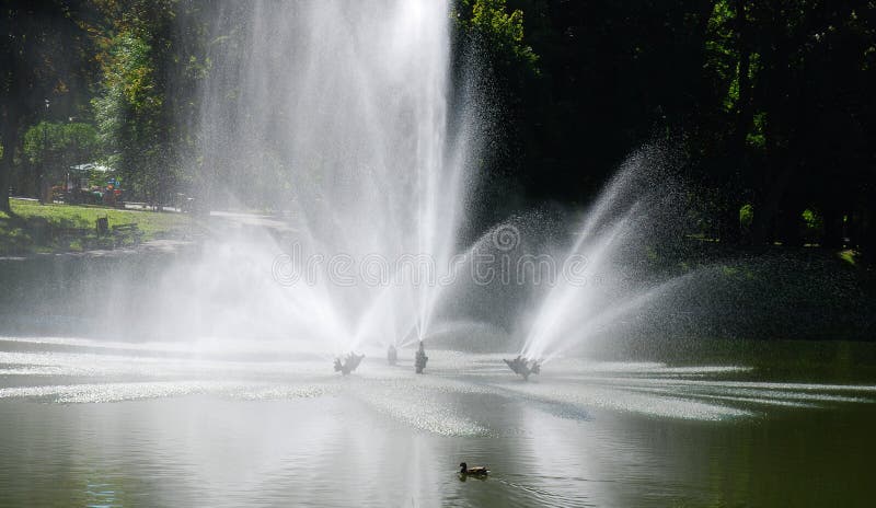 Refractions of Sunlight through a Fountain Stock Photo - Image of light ...