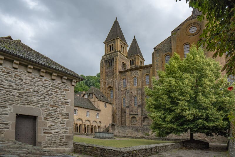 Fountain and Arcade in the Interior Courtyard of the Conques Monastery ...