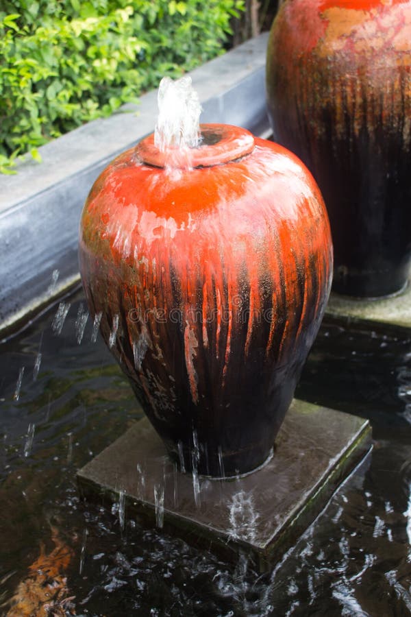 Fountain Bali-style Earthenware Jar in Garden Stock Photo - Image of ...