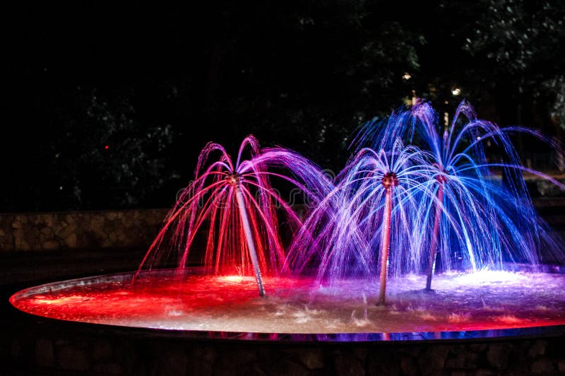 A Fountain with a Beautiful Backlight Litm in the Park Stock Photo ...