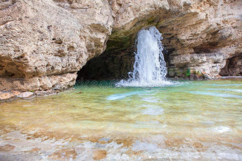 Fountain and cave stock photo. Image of fresh, cavern - 67392464