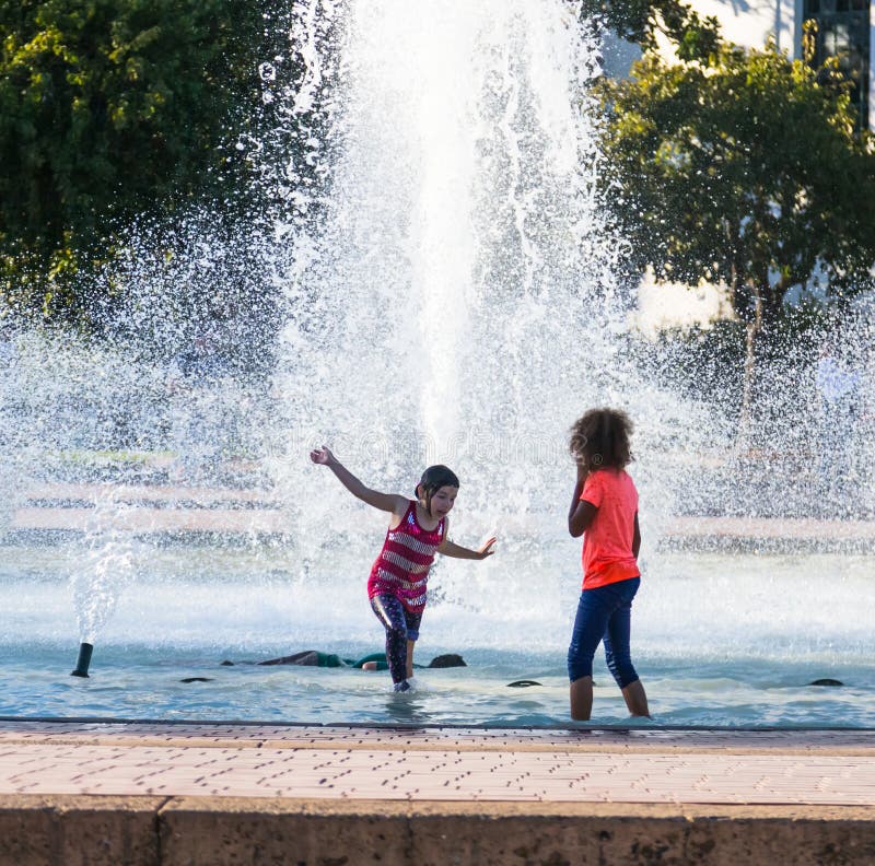 Playing in a Fountain editorial image. Image of children - 46057975