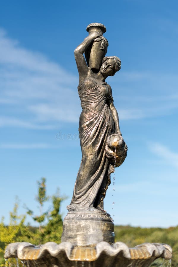 Fountain in the City Park, Woman with a Pitcher Stock Photo - Image of ...