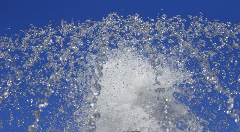 Fountain Drops of Pure Water Against a Blue Sky. Stock Photo - Image of ...