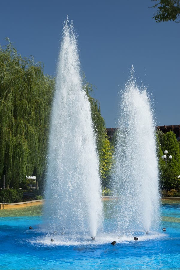 Fountain in formal park stock image. Image of public - 76556297