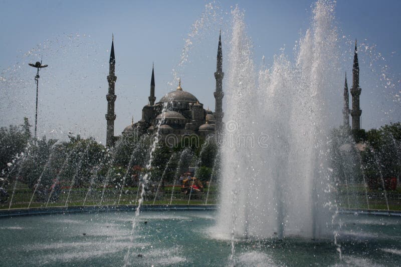 Blue Mosque Behind Water Jets Stock Photo - Image of eruption, jets ...