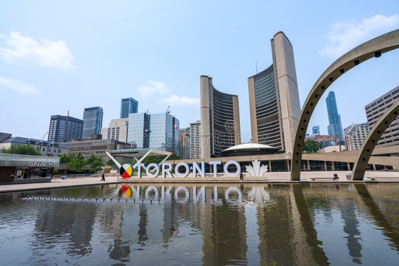 Fountain at Nathan Phillips Square. Toronto Sign Editorial Photography ...