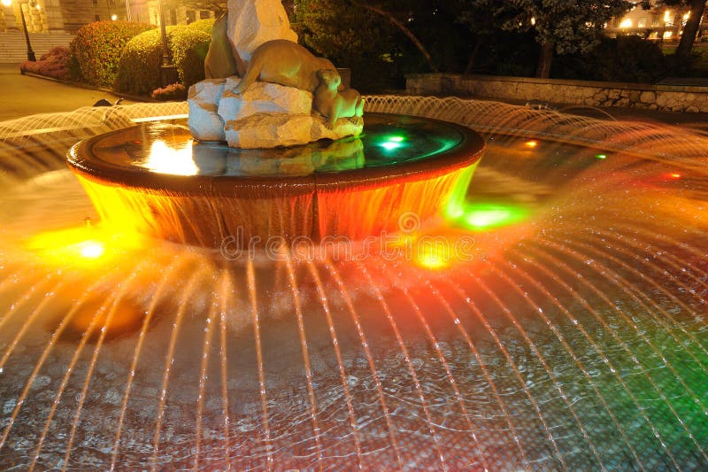 Water fountain at night stock photo. Image of lights - 17429016