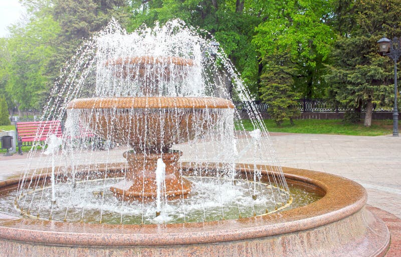 Fountain in the Park. Spraying of Water Streams Stock Photo - Image of ...