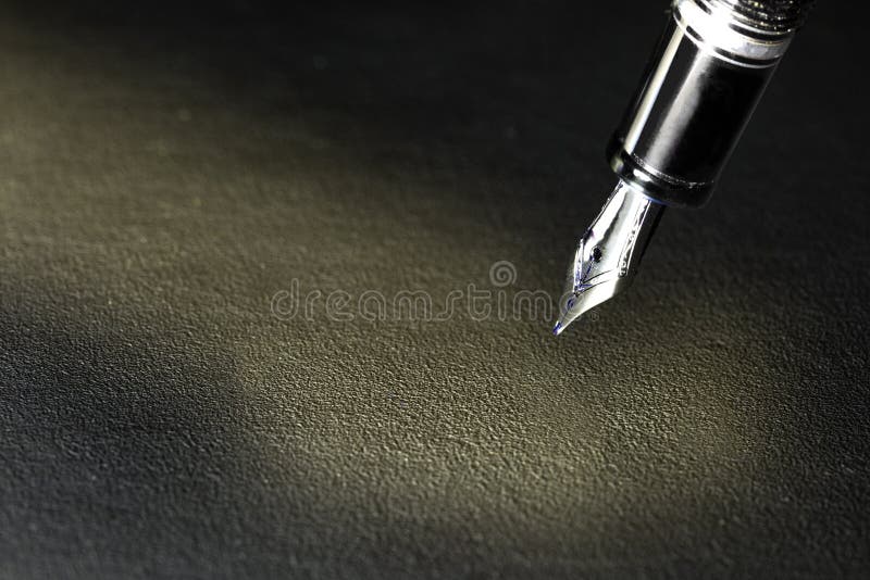 Fountain pen in dark tone stock photo. Image of empty - 75827236