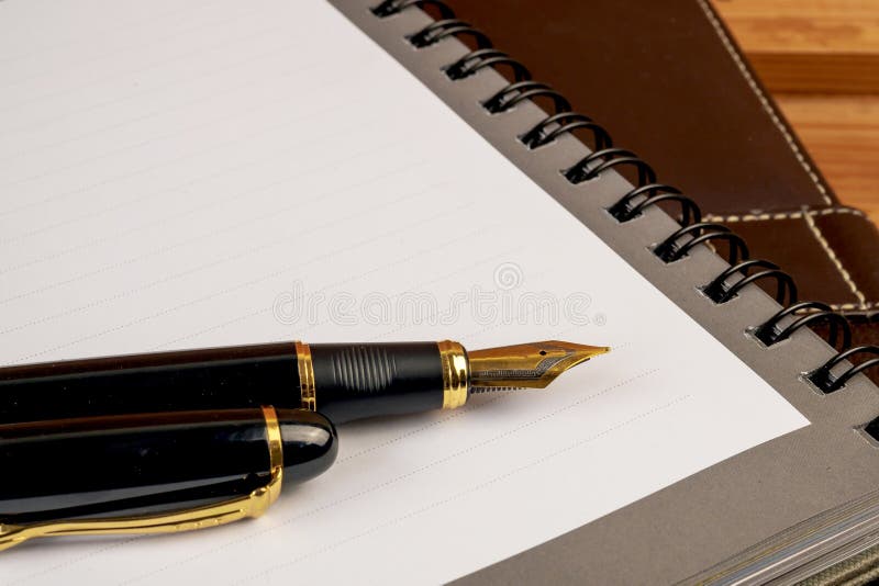 Fountain Pen on Notebook on Table Stock Photo - Image of date, blank ...