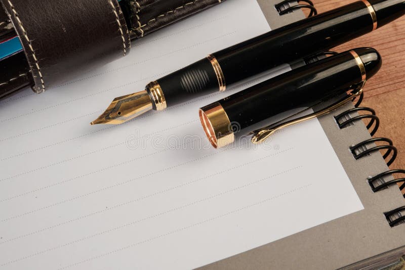 Fountain Pen and Notebook on Table Stock Image - Image of reminder ...
