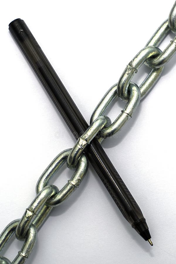 A Fountain Pen Stuck in a Chain on Sheets of White Paper the Concept of ...