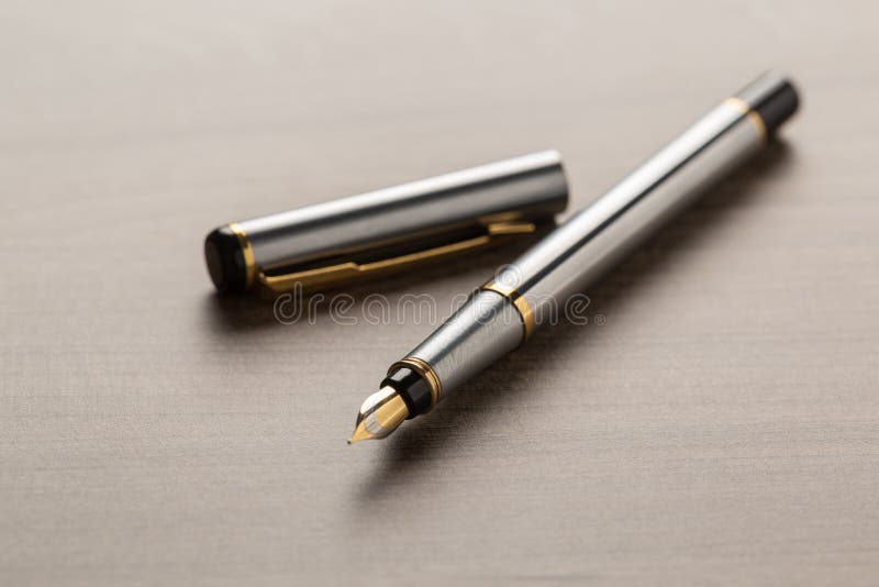 Fountain pen on table stock image. Image of elegant - 141108655