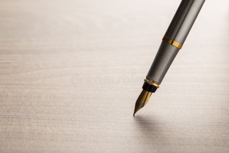 Fountain pen on table stock image. Image of communication - 141247093