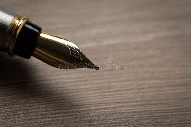 Fountain pen on table stock photo. Image of note, isolated - 143728000