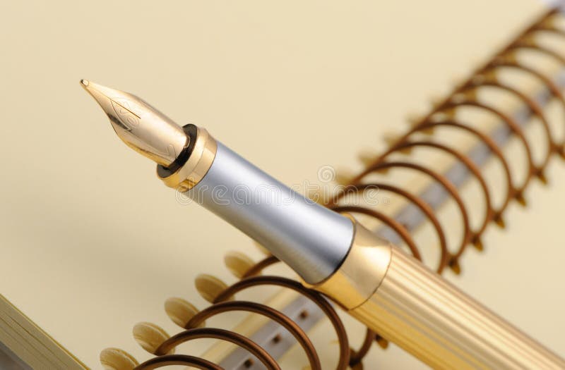 Fountain Pen on a Yellow Notebook Stock Image - Image of notebook, open ...