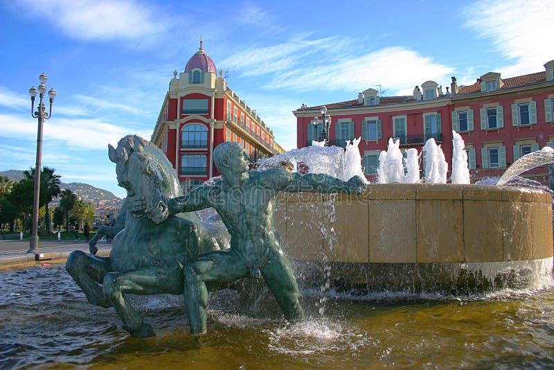 Fountain in Plaza Massena Square Stock Photo - Image of architecture ...