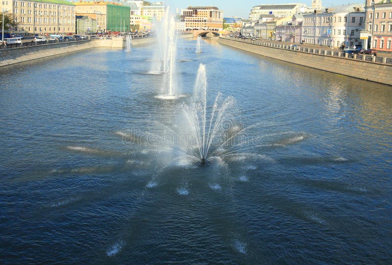 Fountain on river stock photo. Image of bridge, summer - 7590220