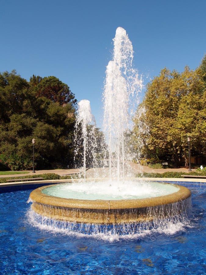 Fountain Spraying Up with Pool of Water Stock Photo - Image of spray ...