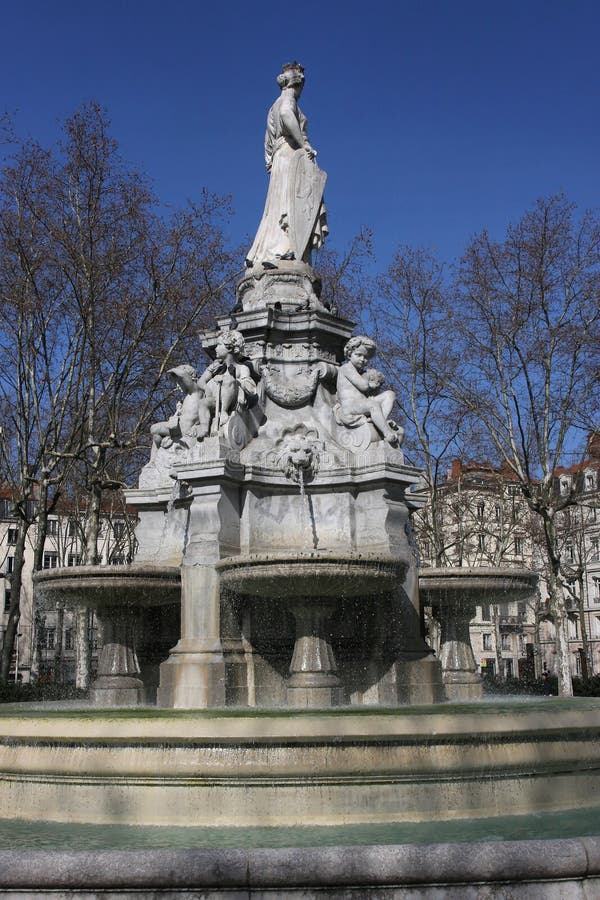 Fountain and Statue in Lyon Stock Photo - Image of water, tree: 13416236