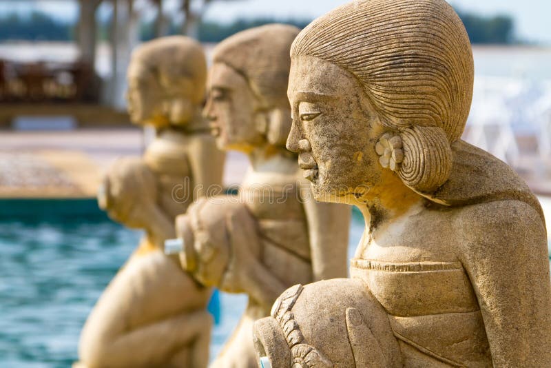 Fountain Statues at the Tropical Swimming Pool Stock Photo - Image of ...
