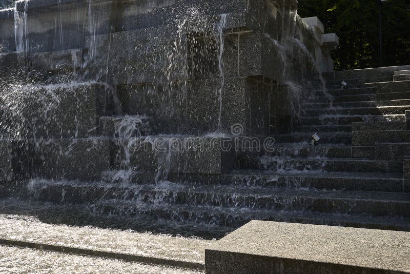 Fountain - stone blocks stock photo. Image of splashing - 238472002
