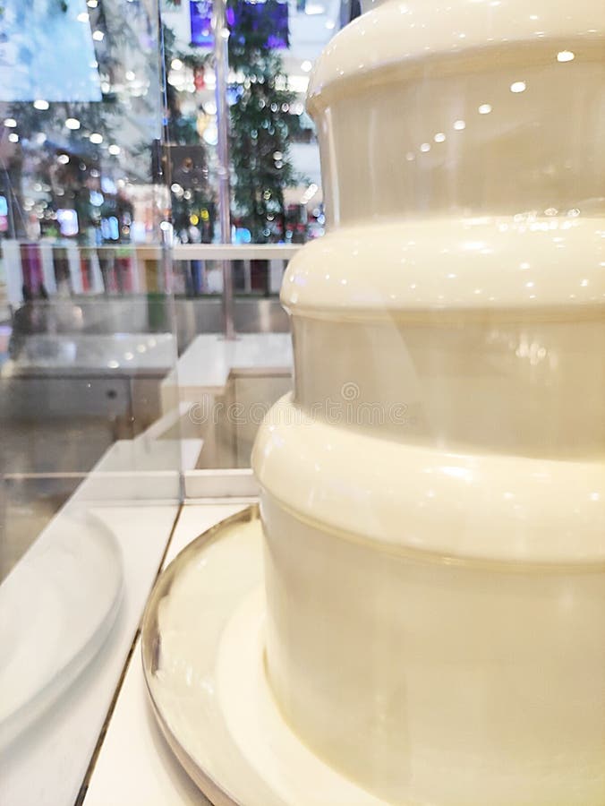 Fountain of White Sweet Chocolate in Several Tiers Stock Photo - Image ...