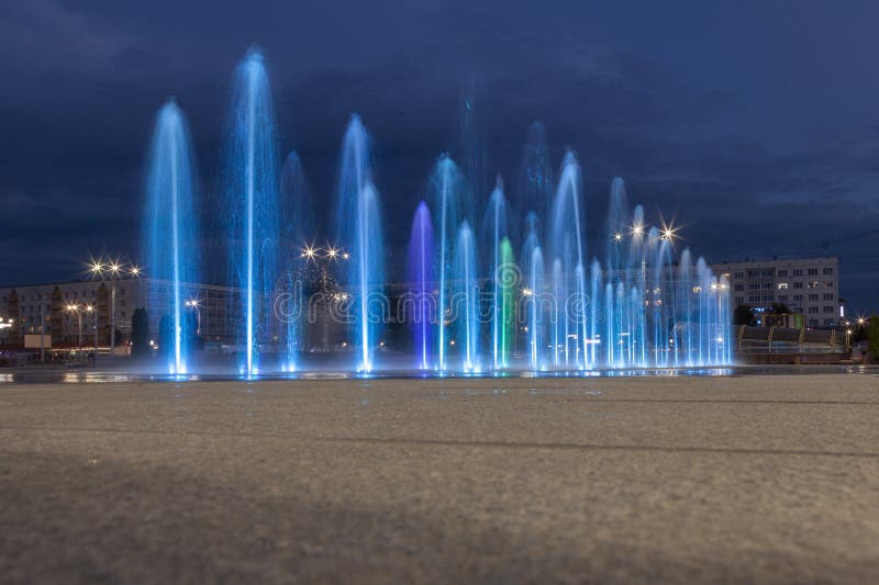 Fountains Illuminated in Blue in the City Square Stock Image - Image of ...