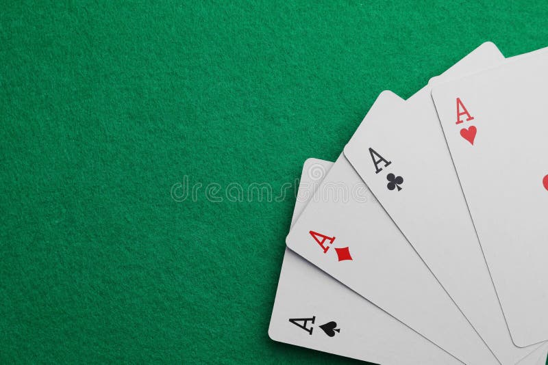 Four Aces Playing Cards on Green Table, Top View. Space for Text Stock ...