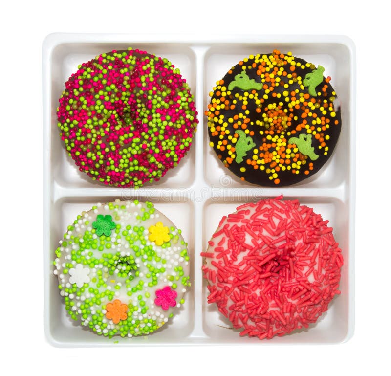 Four assorted doughnuts stock photo. Image of yummy, collection - 34695558