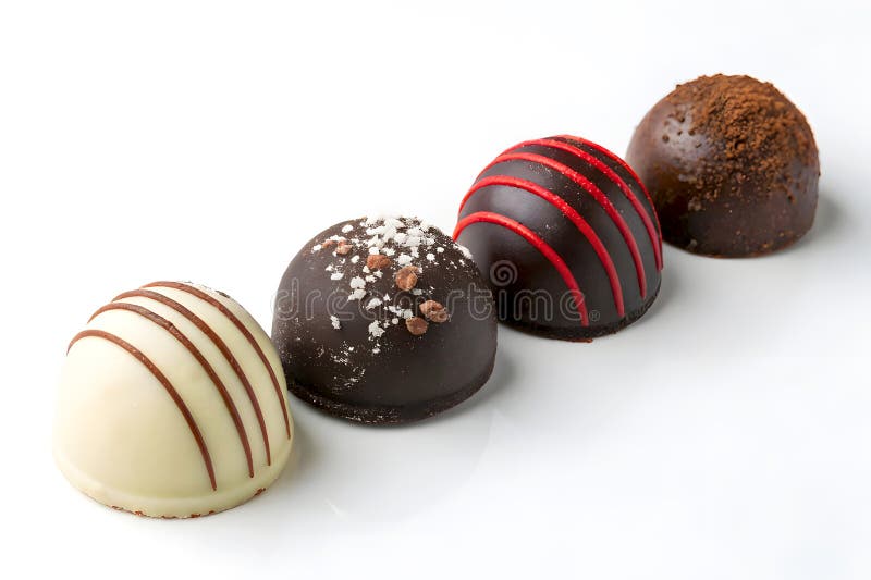 Four Assorted Gourmet Chocolate Truffles Stock Illustration ...