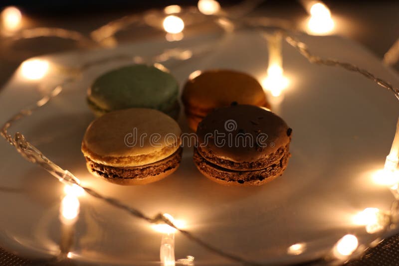 Four Assorted Macaroons On Plate Picture. Image: 109916696
