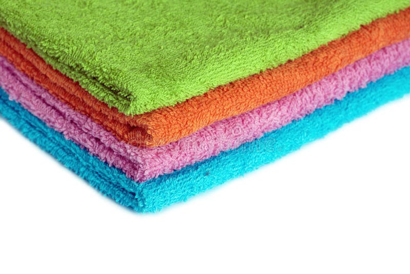 Four Bath Towels of Different Colors Stacked Isolated Stock Photo ...