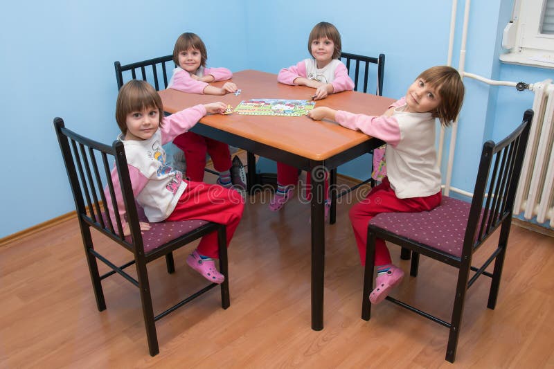 Four Beautiful Identical Girls - Quadruplet Stock Photo - Image of ...