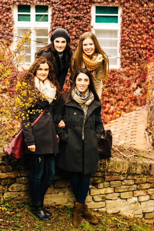 Four beautiful young women stock image. Image of laughing - 64132539