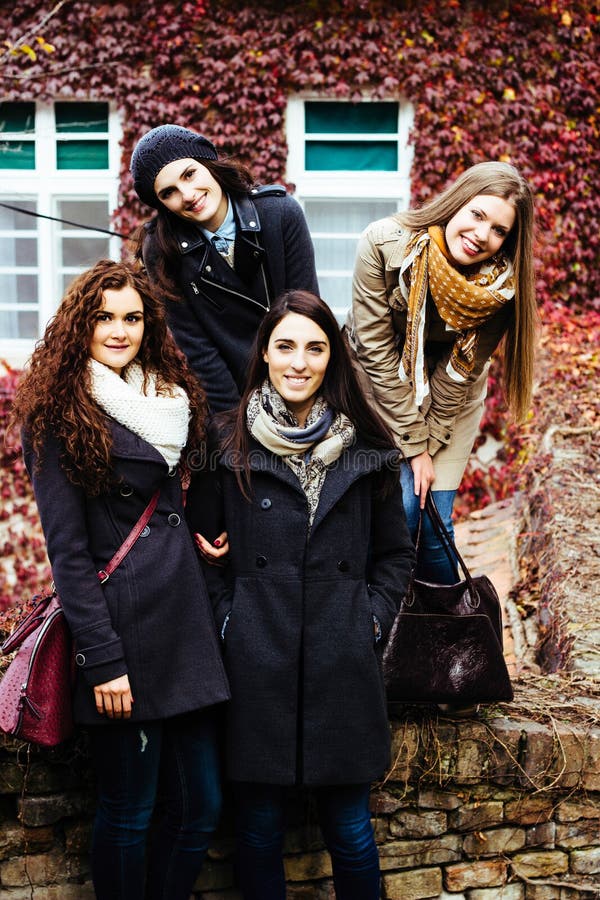 Four Beautiful Young Women Smiling Stock Image - Image of friends ...