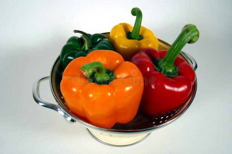 Four Bell Peppers stock image. Image of yellow, farm - 10860033