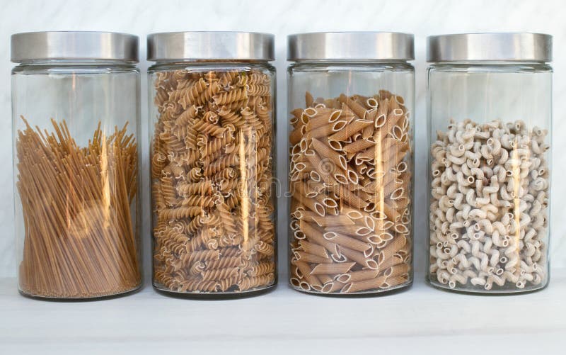 Four Big Glass Jars with Different Whole Grain Pasta Stock Image ...