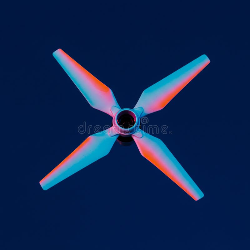 A Four-blade Propeller is Centered Against a Dark Blue Background. the ...