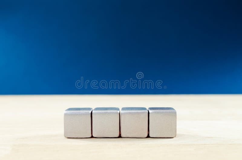 Four Blank Silver Blocks Placed in a Row Stock Image - Image of note ...