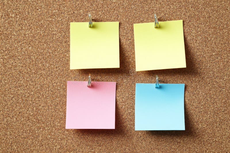 Four Blank Sticky Notes in Yellow, Pink, and Blue Colors Pinned in a ...