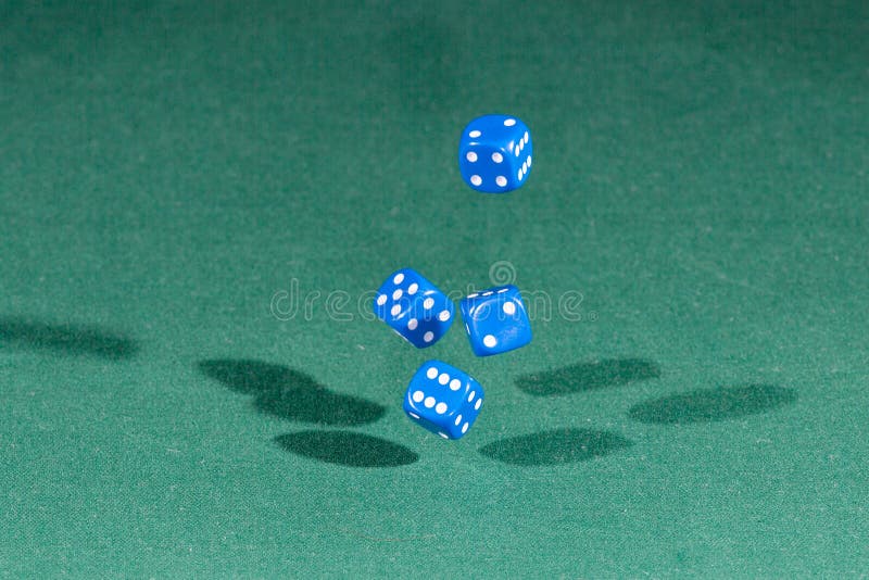 Four Blue Dices Falling on a Green Table Stock Photo - Image of gaming ...